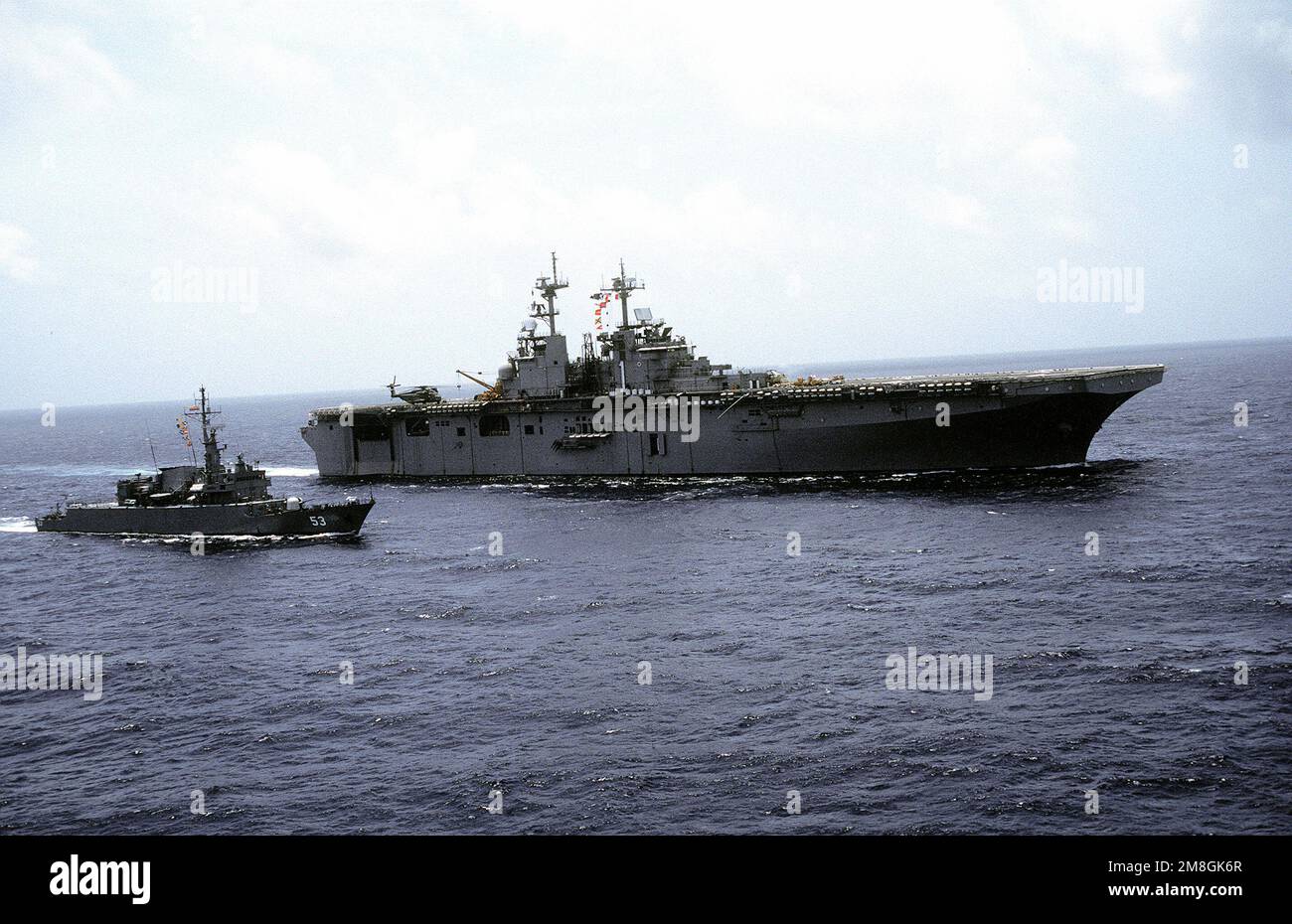 The Colombian frigate ANTIOQUIA (F-53) escorts the amphibious transport ...