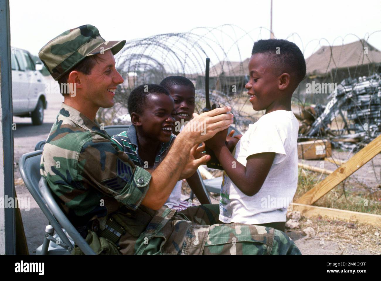 USAF SSGT John McLauglin, 554th Security Police Squadron plays with ...