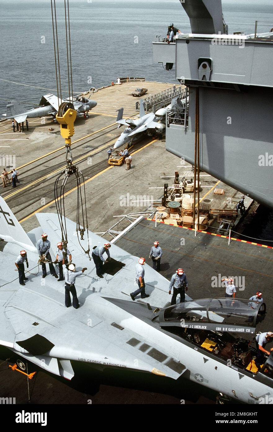 A Fighter Squadron 142 (VF-142) F-14A Tomcat aircraft is readied for ...