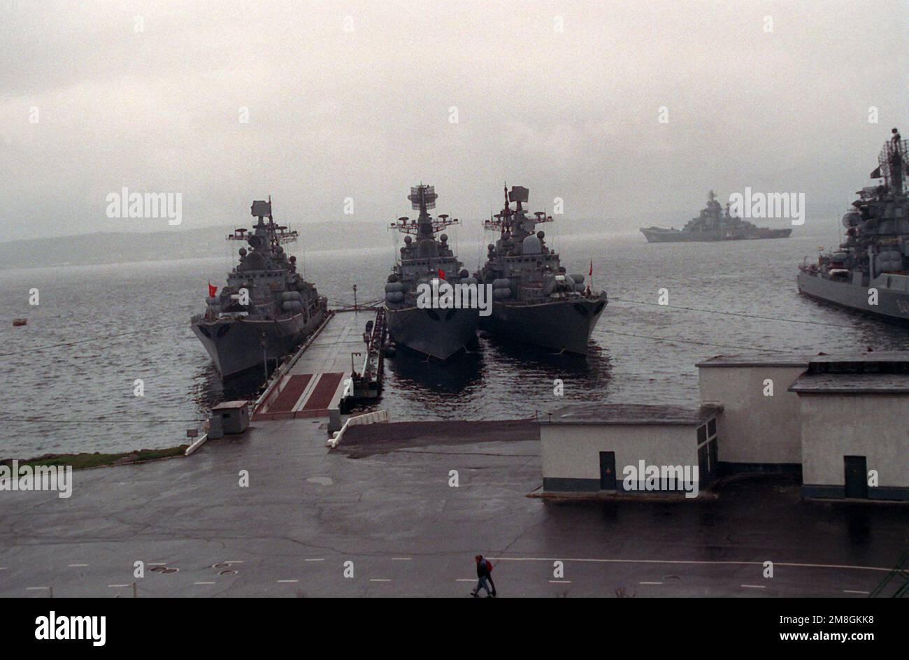 Three Russian Sovremenny-class guided missile destroyers are moored at ...
