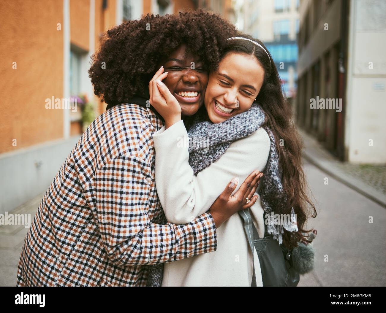 Fashion, city and friends hug in street enjoying holiday, vacation and ...