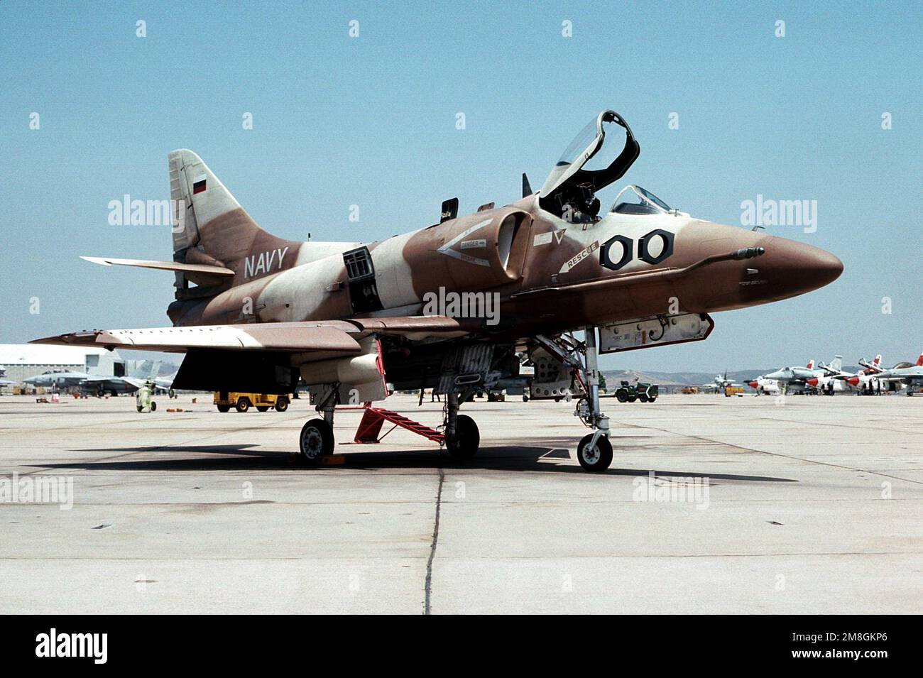 A Fighter Squadron 126 (VF-126) A-4 Skyhawk aircraft is parked on the ...