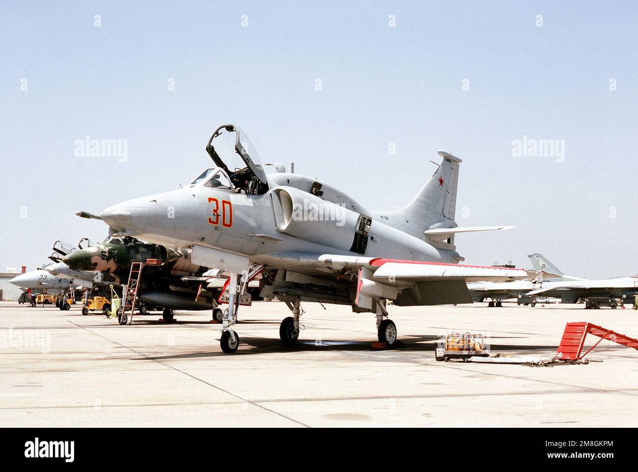 Fighter Squadron 126 (VF-126) A-4 Skyhawk aircraft line the flight line ...