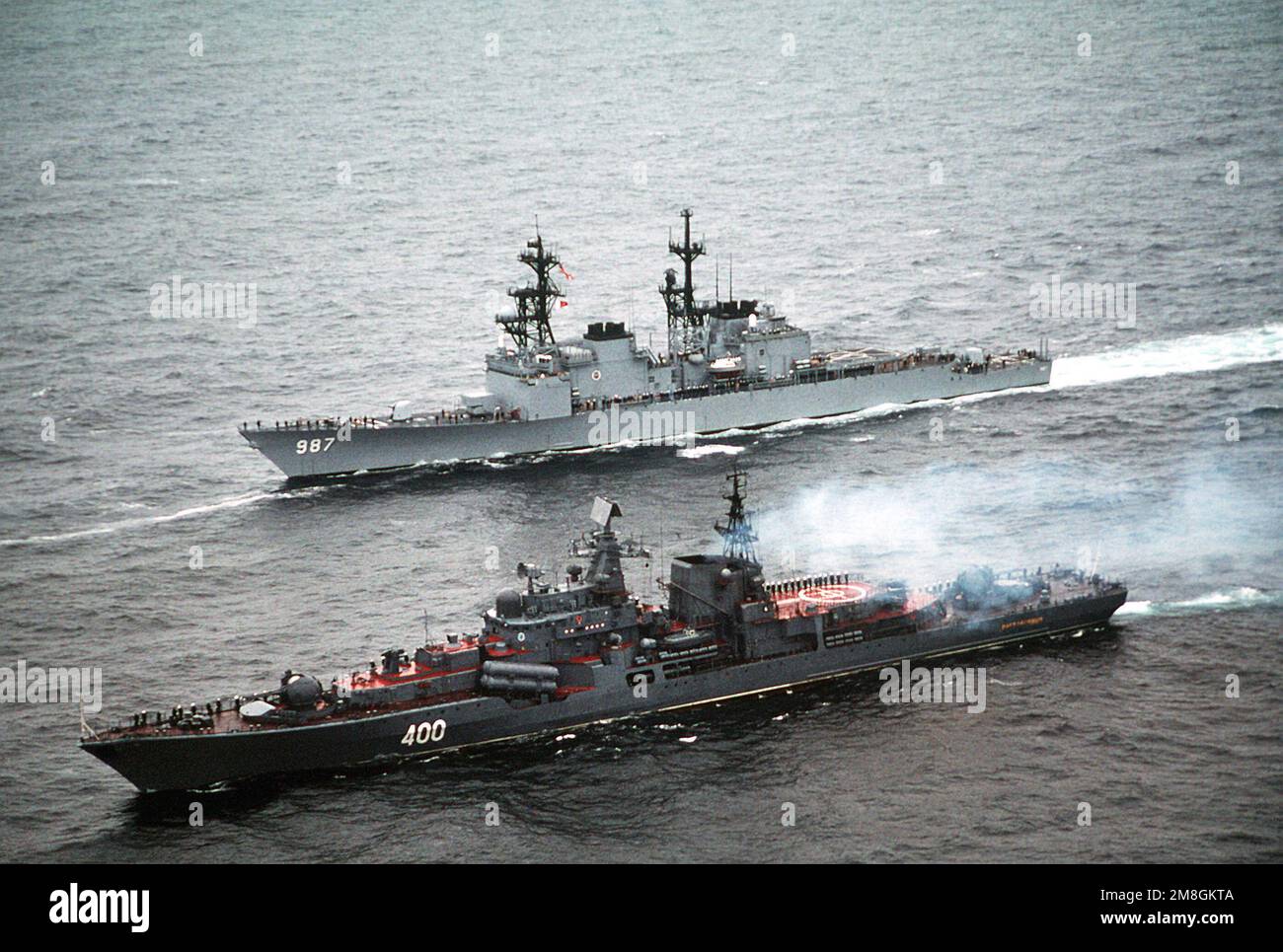 With the crews of both ships manning the rails in the naval tradition ...