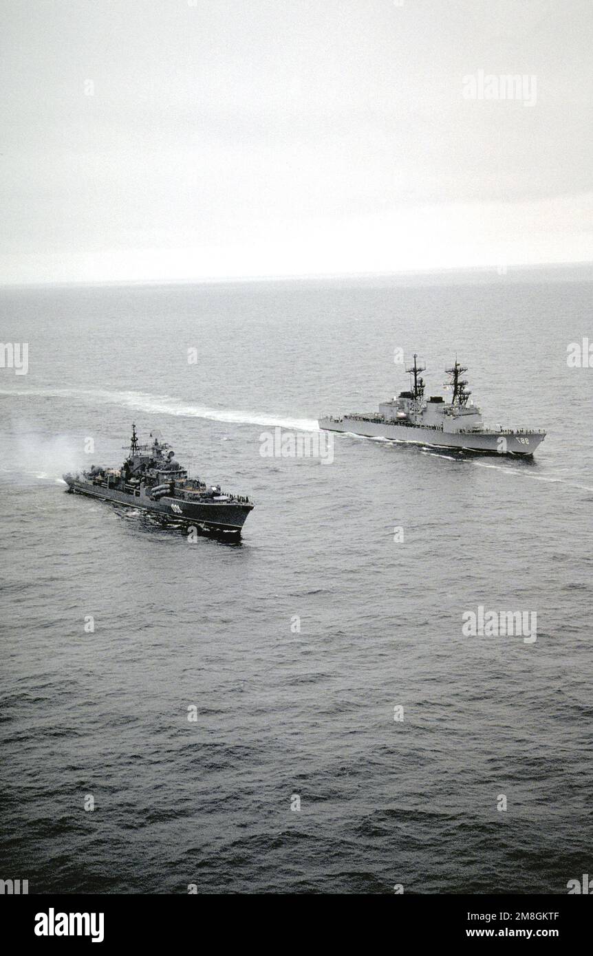 With the crews of both ships manning the rails in the naval tradition ...