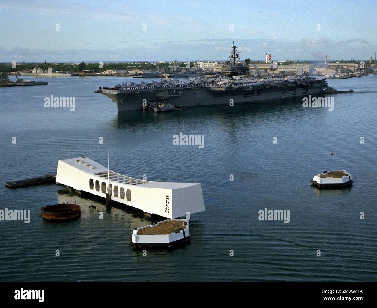 Sailors man the rails aboard the aircraft carrier USS KITTY HAWK (CV-63 ...