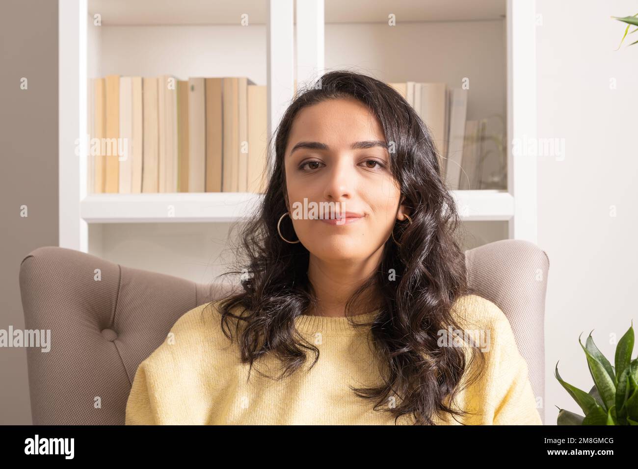 Beautiful girl relaxing in chair hi-res stock photography and images - Alamy