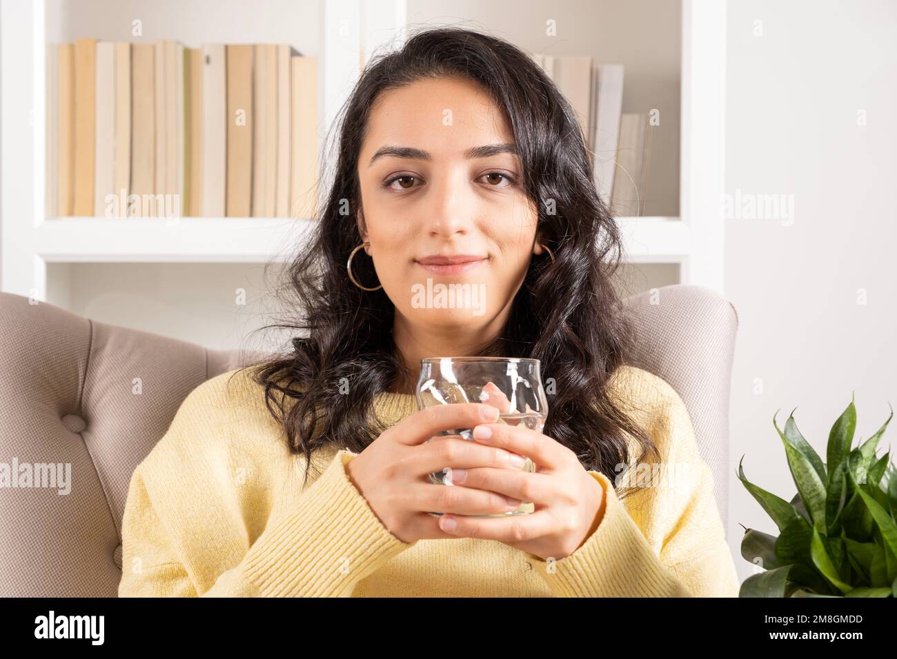 Woman drink glass water smiling home hi-res stock photography and ...