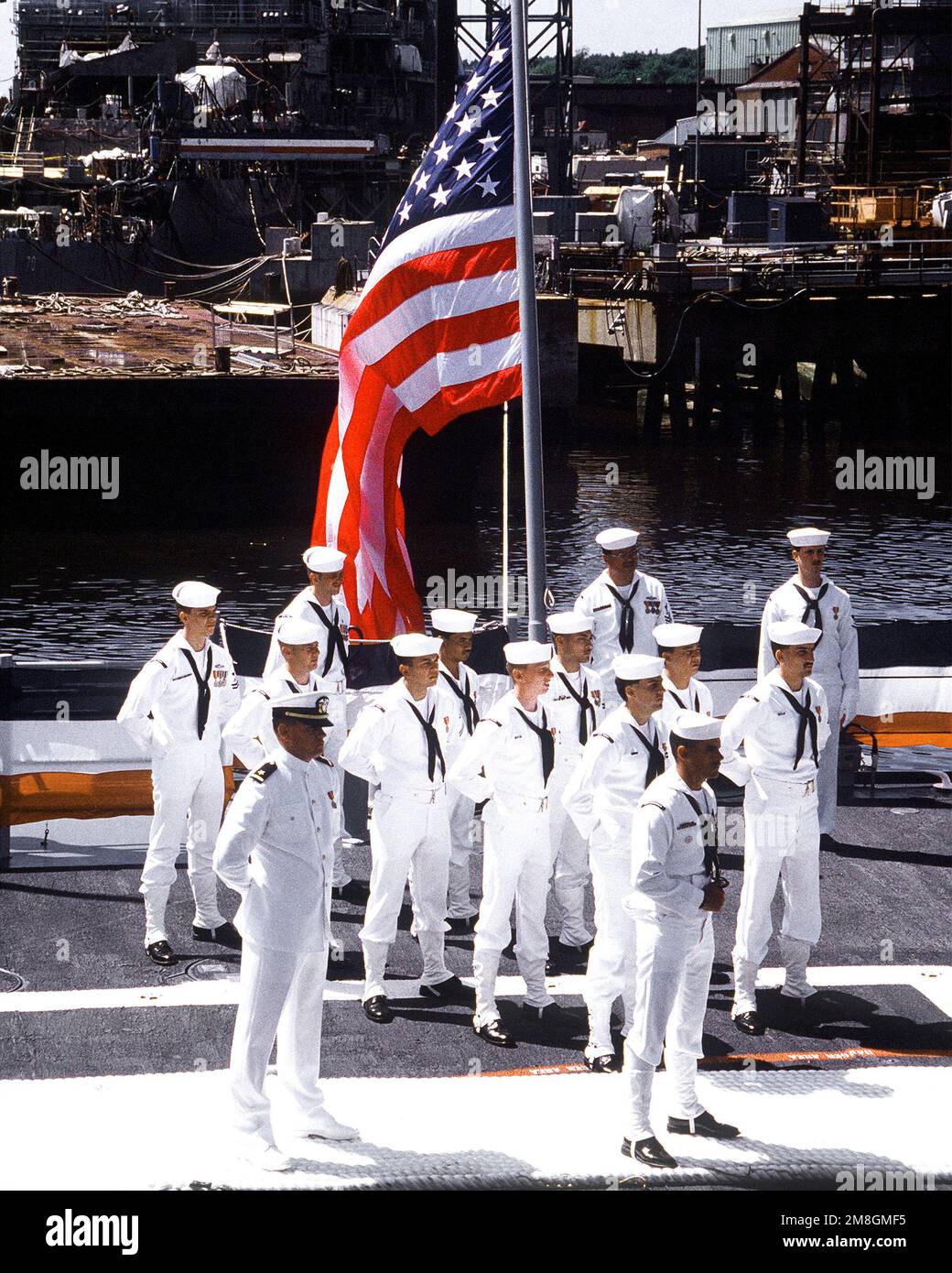 The color guard of the guided missile cruiser USS SHILOH (CG-67) stands ...