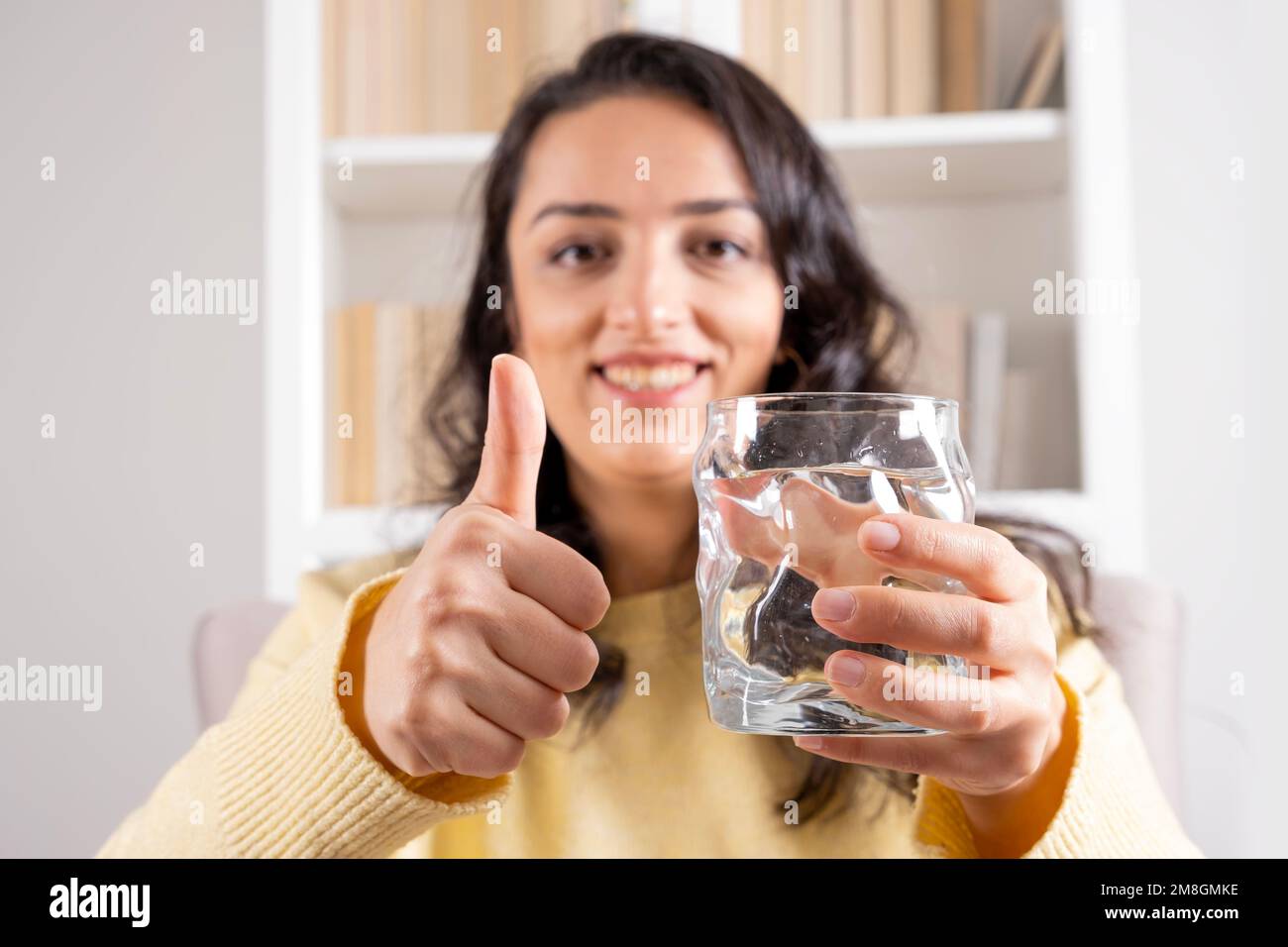 Woman Holding Glass Of Water Smiling Happy Caucasian Girl Recommend