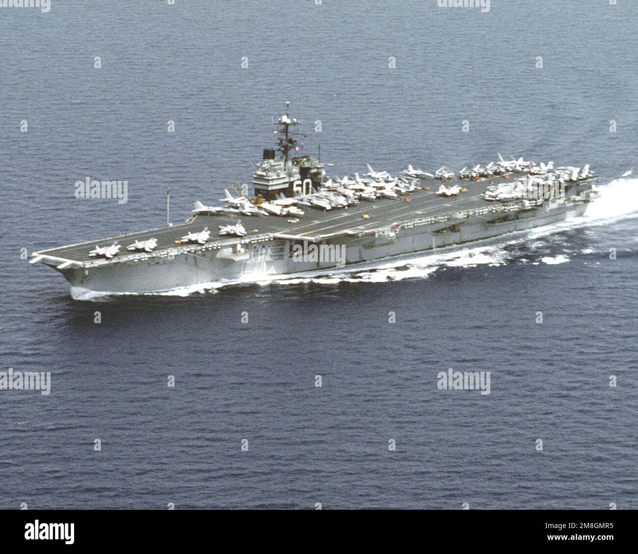 A port bow view of the aircraft carrier USS SARATOGA (CV-60) underway ...