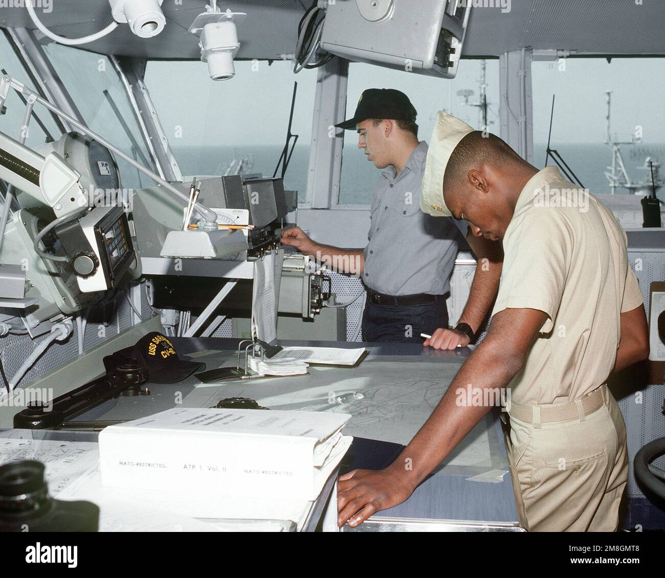 The navigation watch on the bridge of the aircraft carrier USS SARATOGA ...
