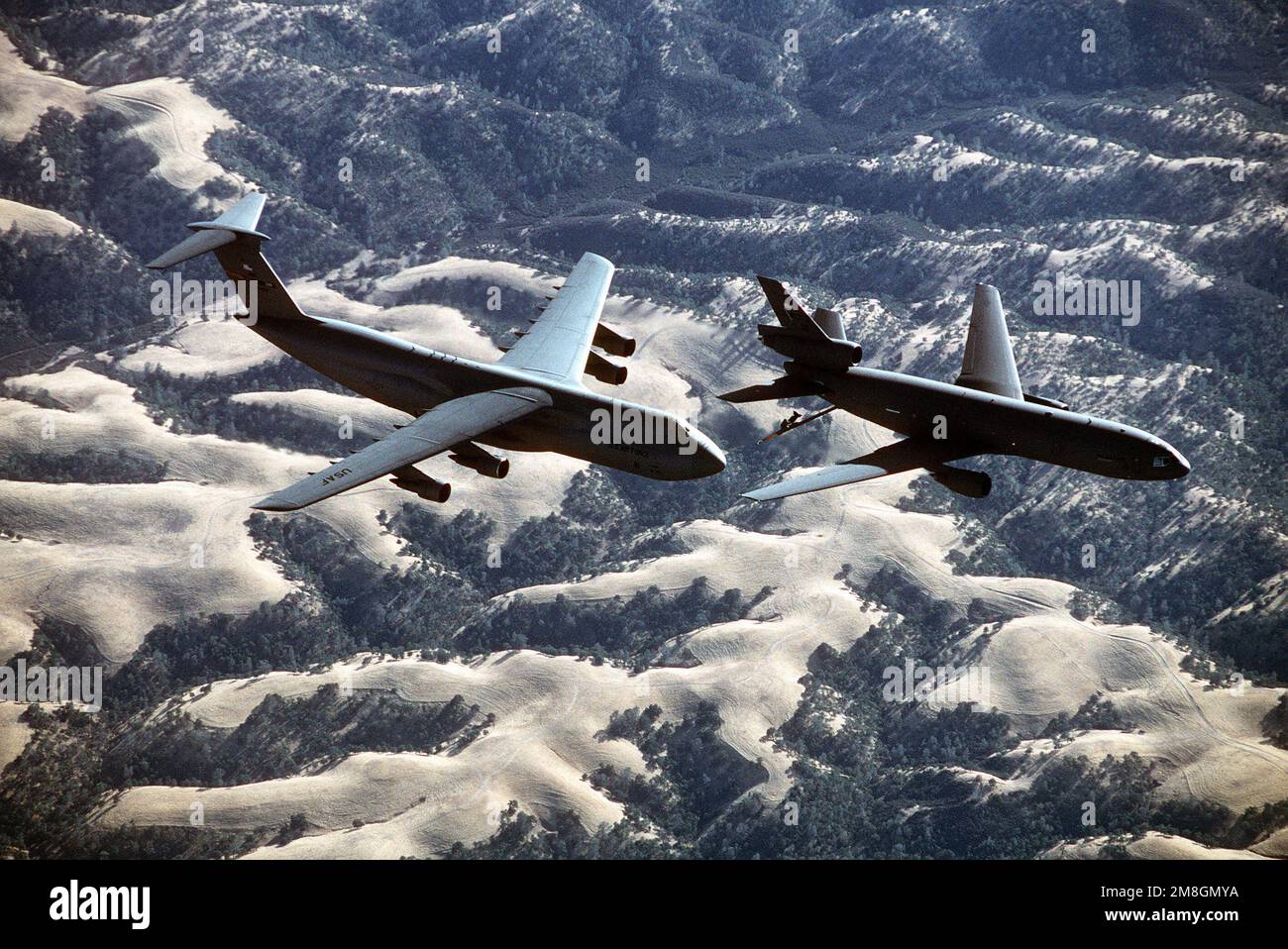 Air to air top view of a USAF's Air Mobility Command, C-5 Galaxy ...