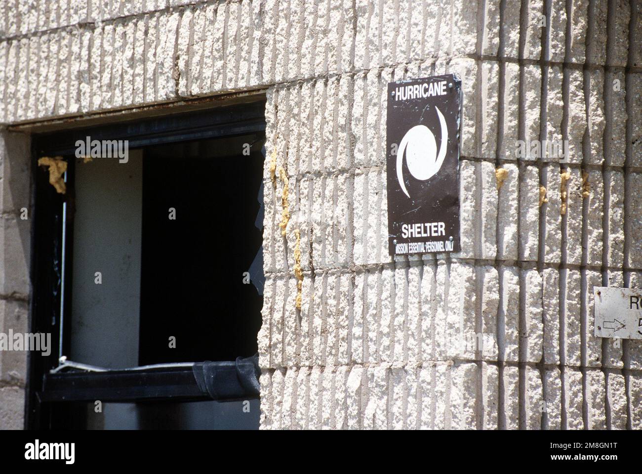 A window's glass panes are blown out in the aftermath of Hurricane ...