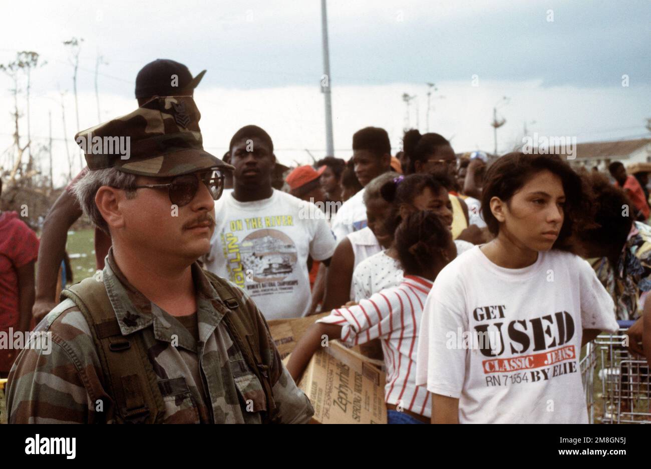 Mess Management SPECIALIST 1ST Class Bryan I. Schlay provides security ...