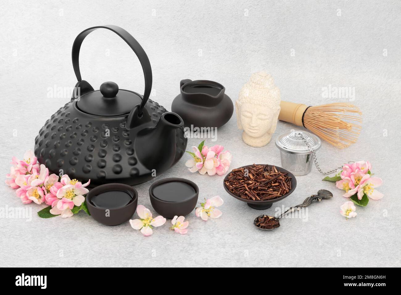 Kukicha twig and apple blossom tea drink. Japanese ceremony with ...