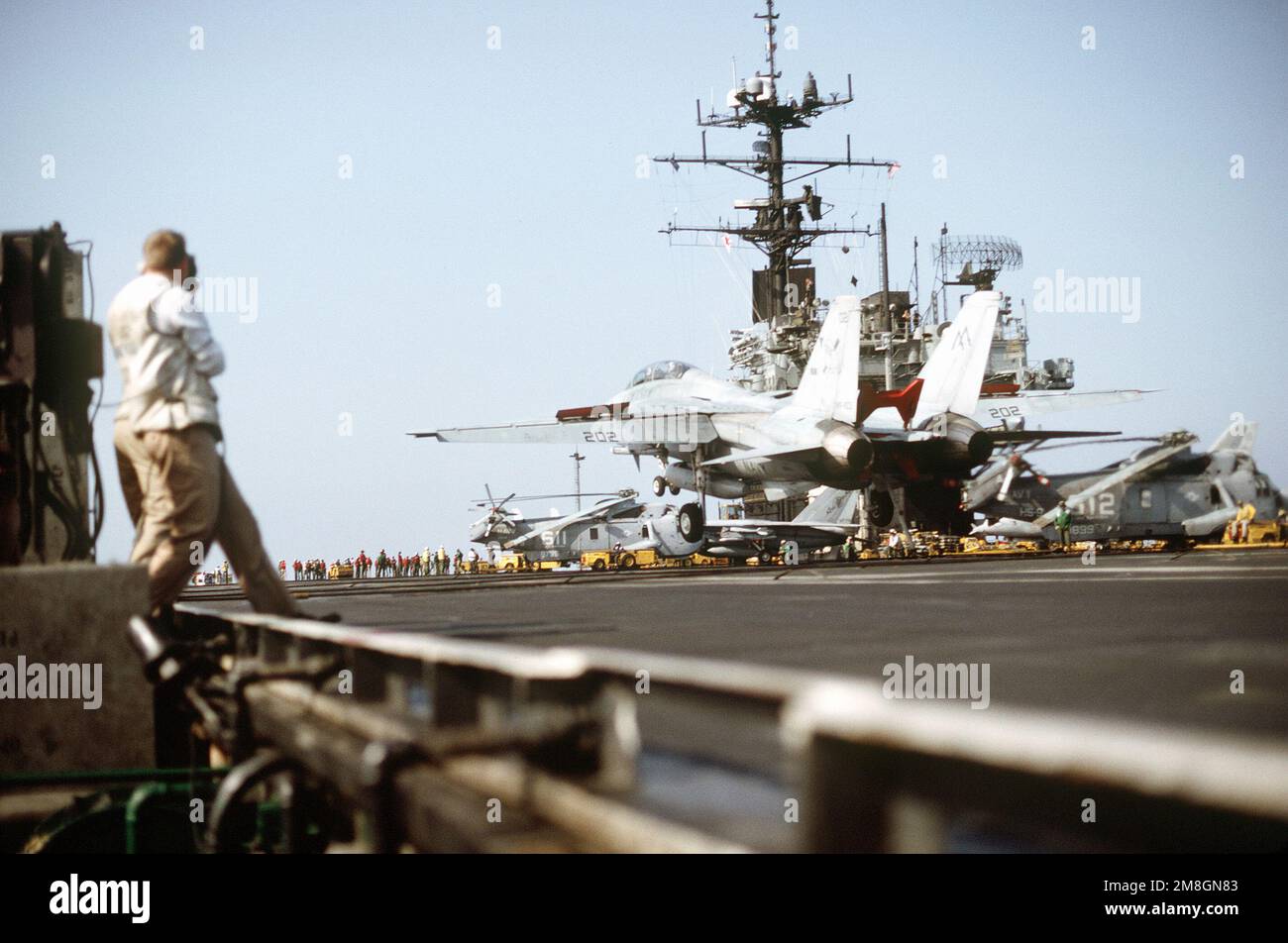 A Fighter Squadron 103 (VF-103) F-14B Tomcat aircraft lands on the ...