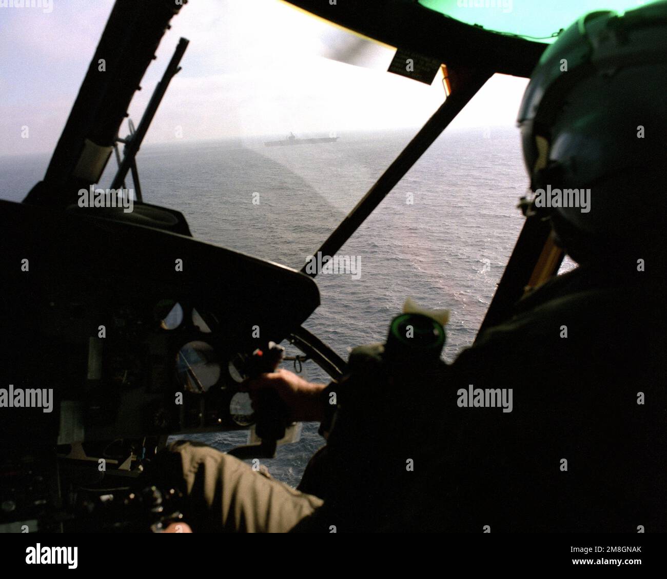 The pilot of a Helicopter Anti-submarine Squadron 85 (HS-85) SH-3H Sea ...