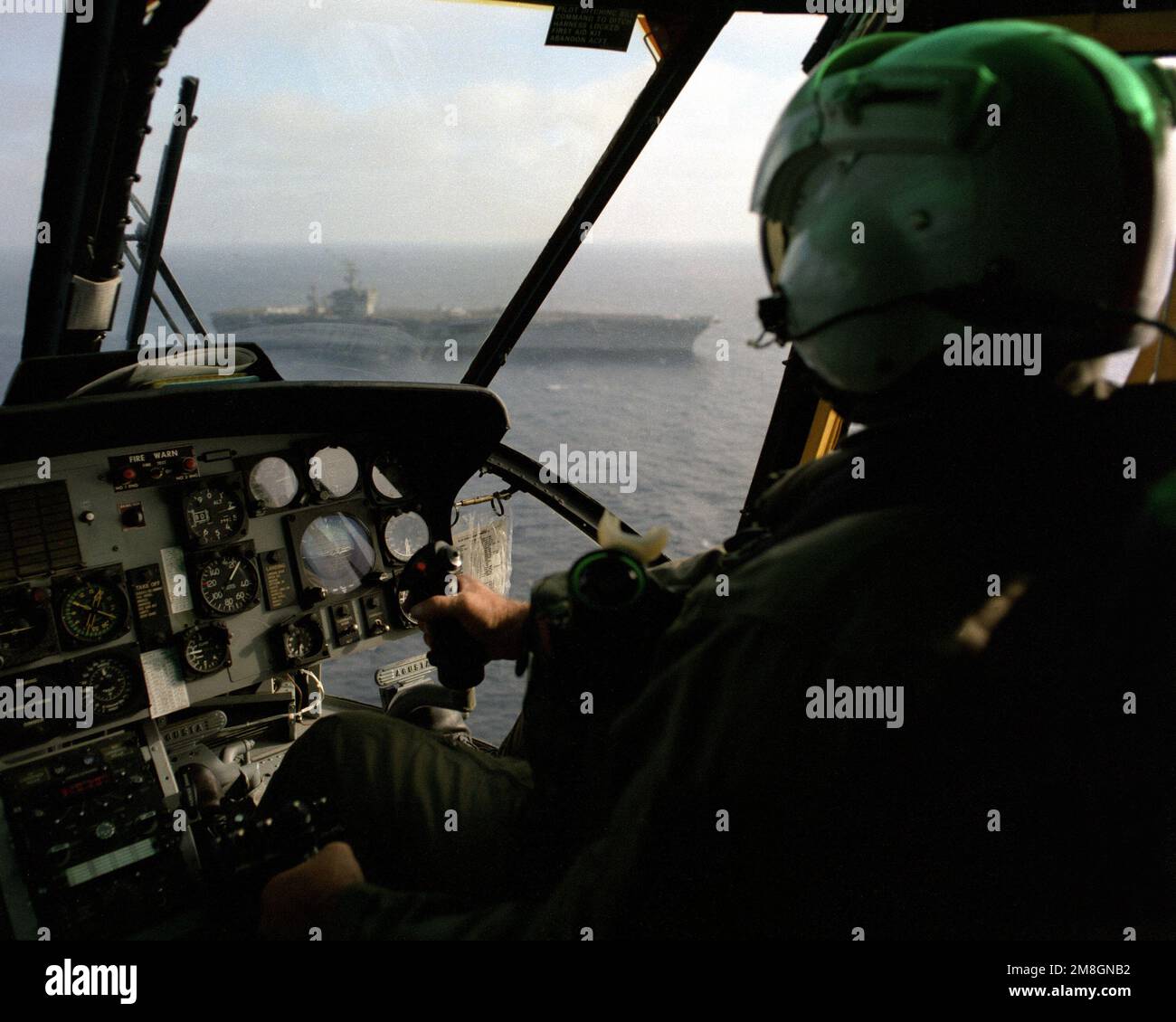 The pilot of a Helicopter Anti-submarine Squadron 85 (HS-85) SH-3H Sea ...