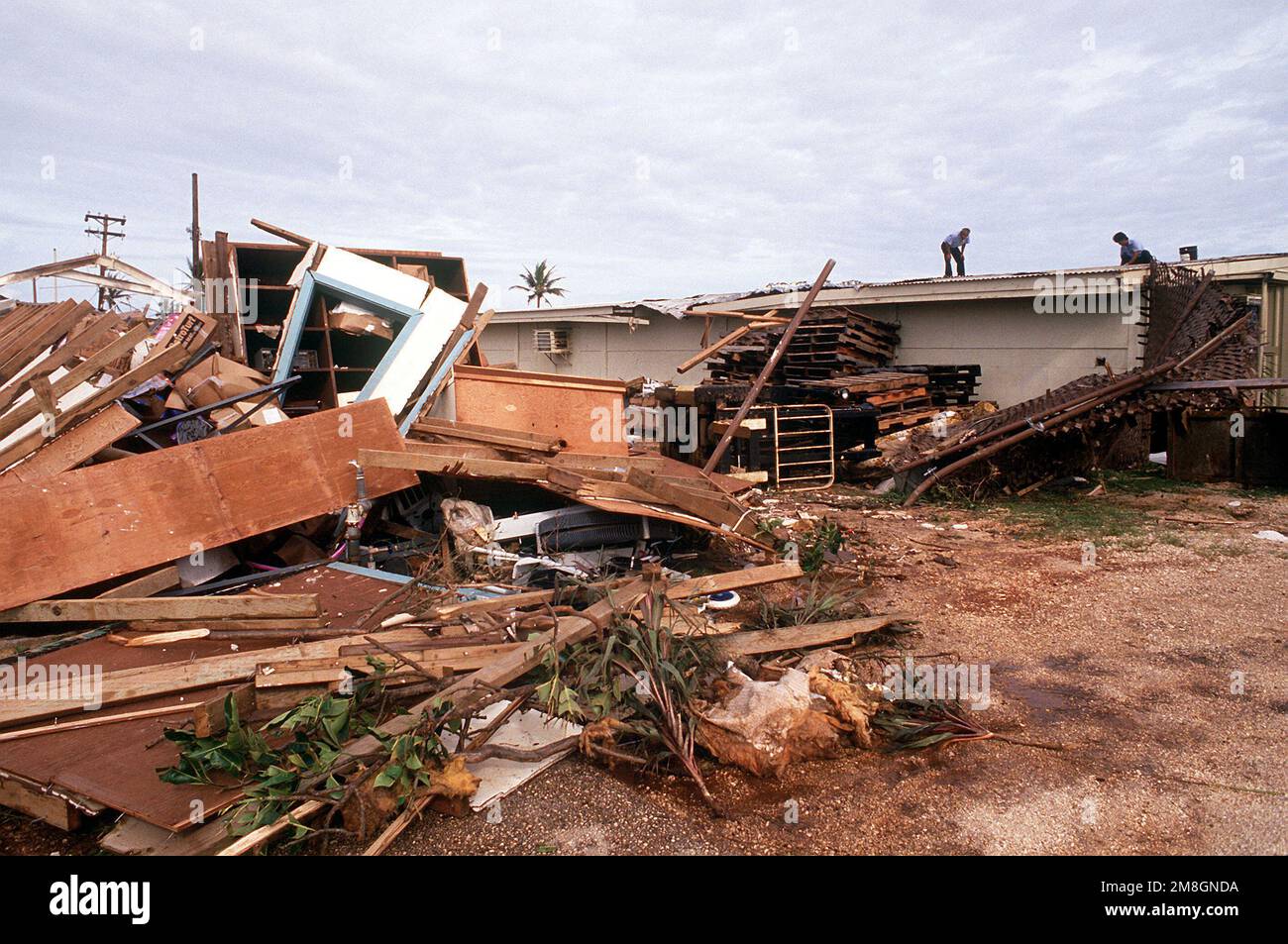Destroyed buildings display the effects of Typhoon Omar, which struck ...
