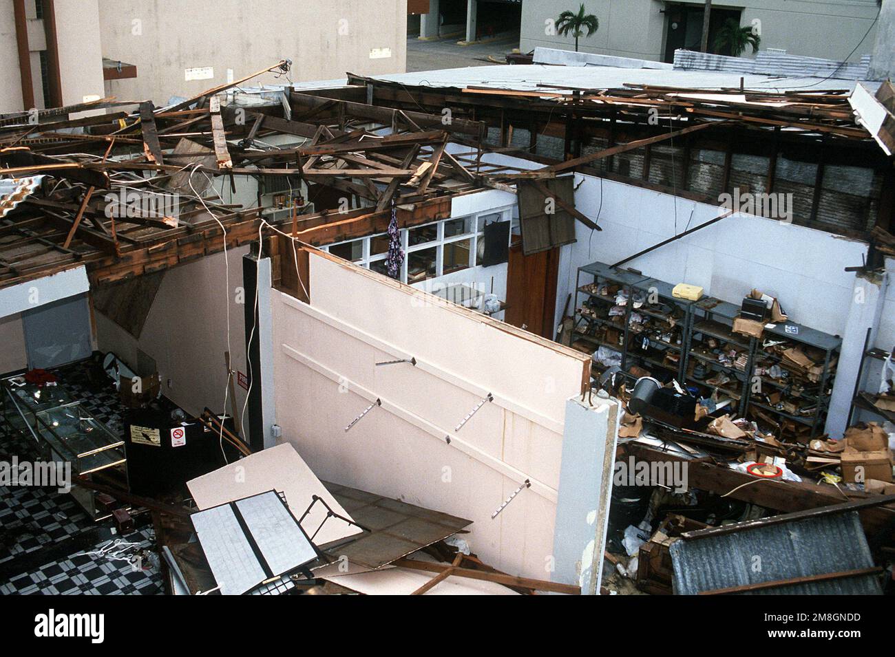 A demolished building displays the effects of Typhoon Omar which struck ...