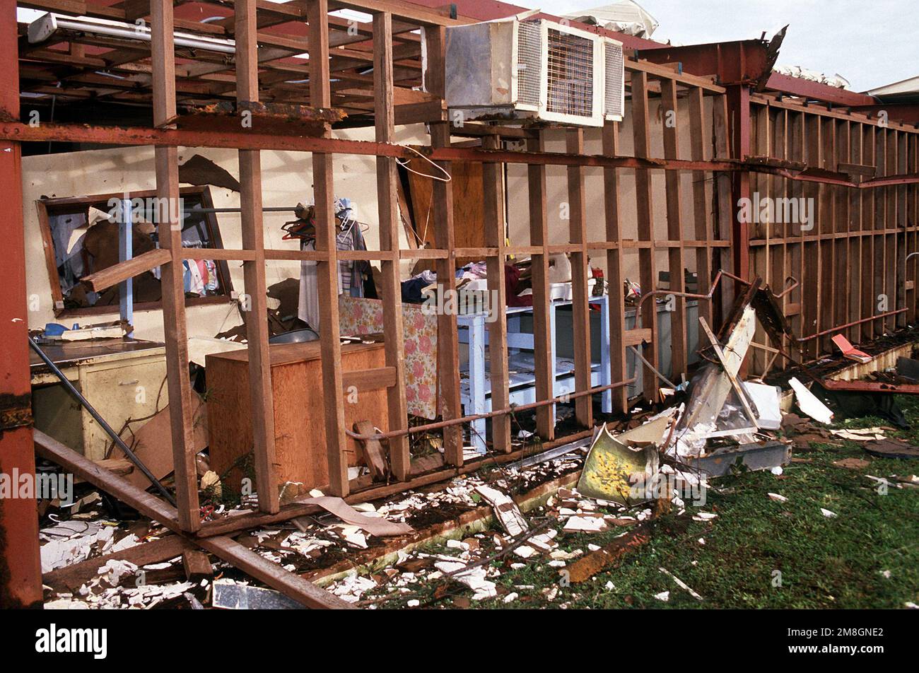 Destroyed buildings display the effects of Typhoon Omar, which struck ...