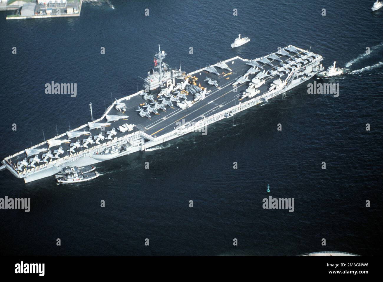 Sailors man the rails aboard the aircraft carrier USS RANGER (CV-61 ...