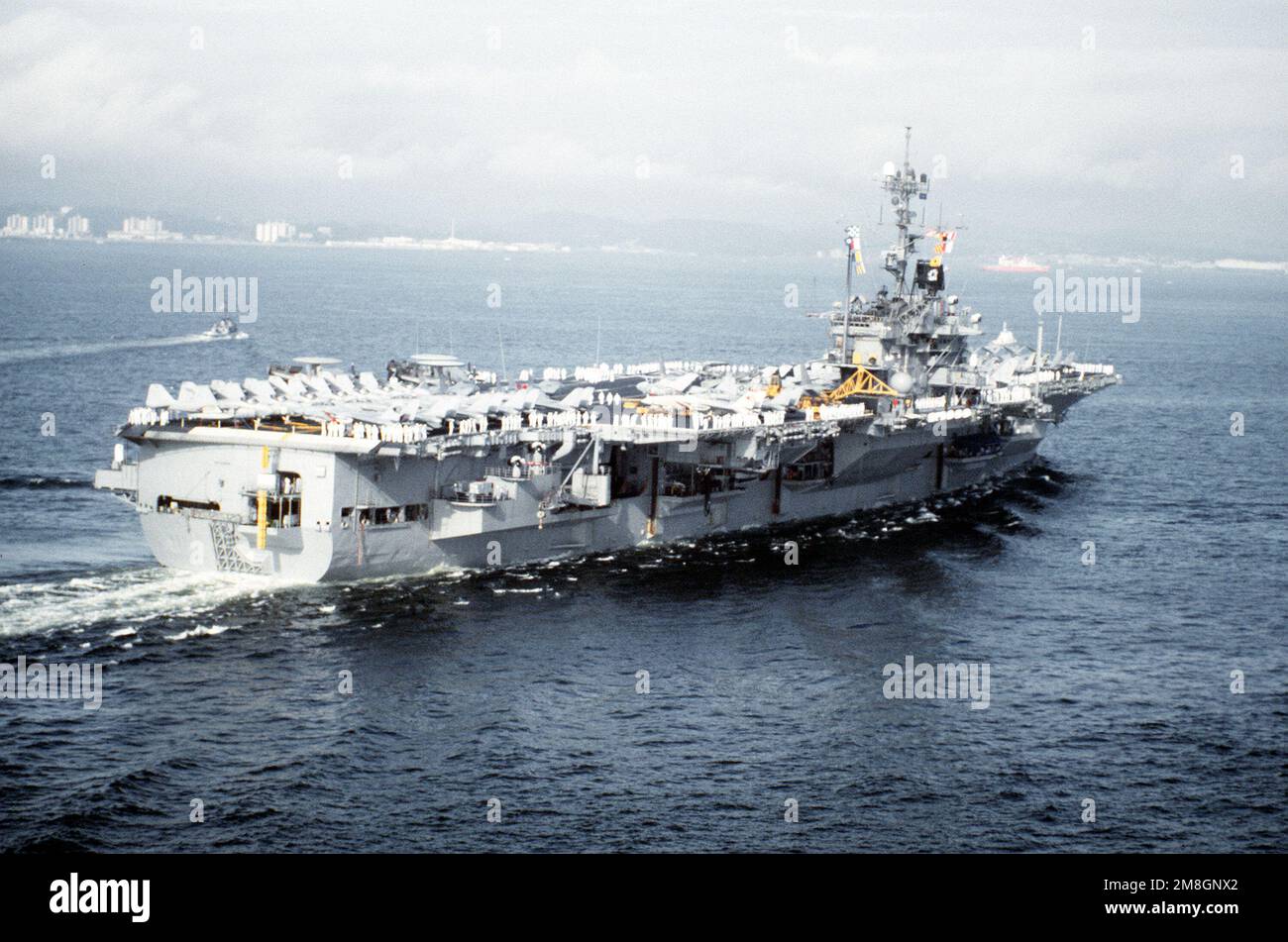 Sailors man the rails as the aircraft carrier USS RANGER (CV-61 ...