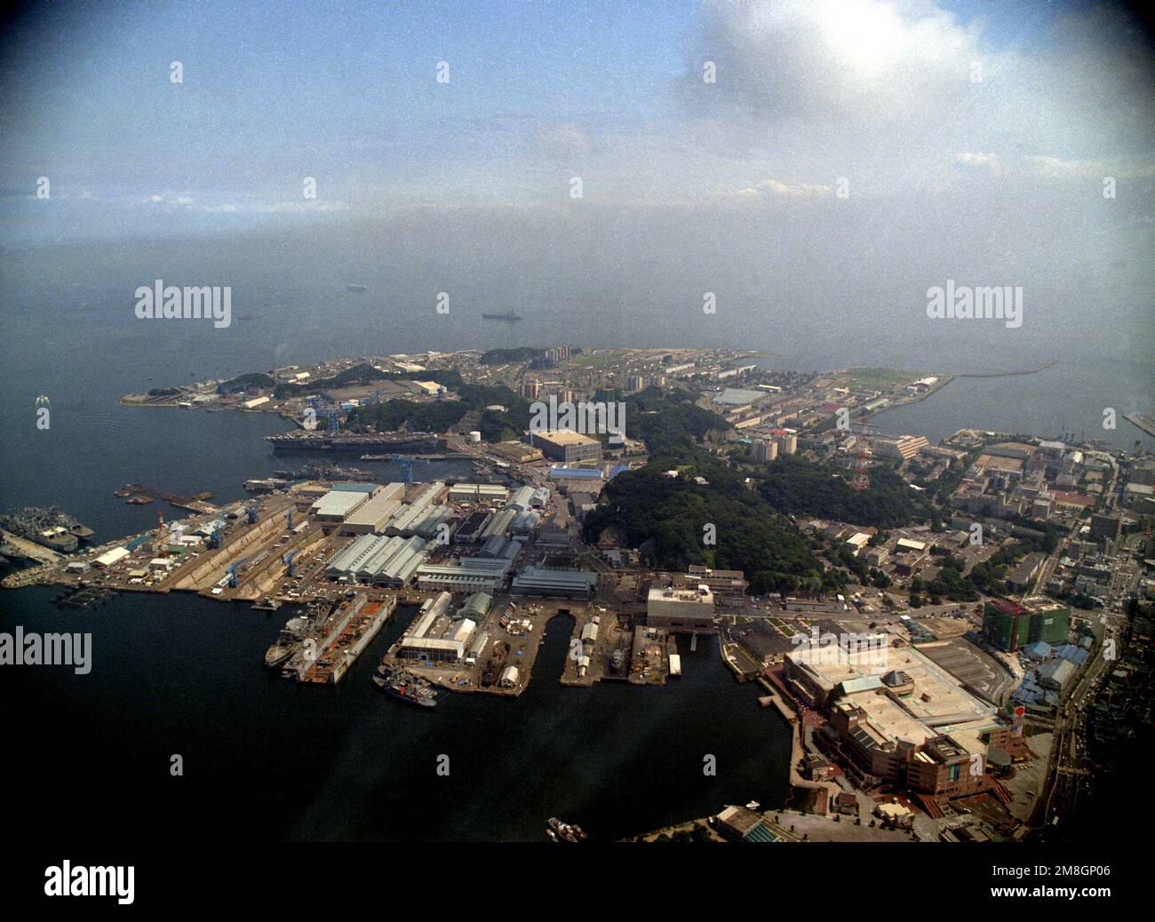 An aerial view of the station, with the aircraft carrier USS RANGER (CV ...