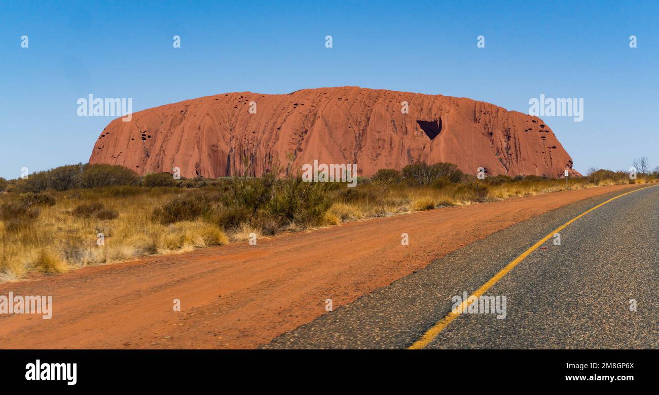 A landscape of a deserted valley at the highway road on the background ...