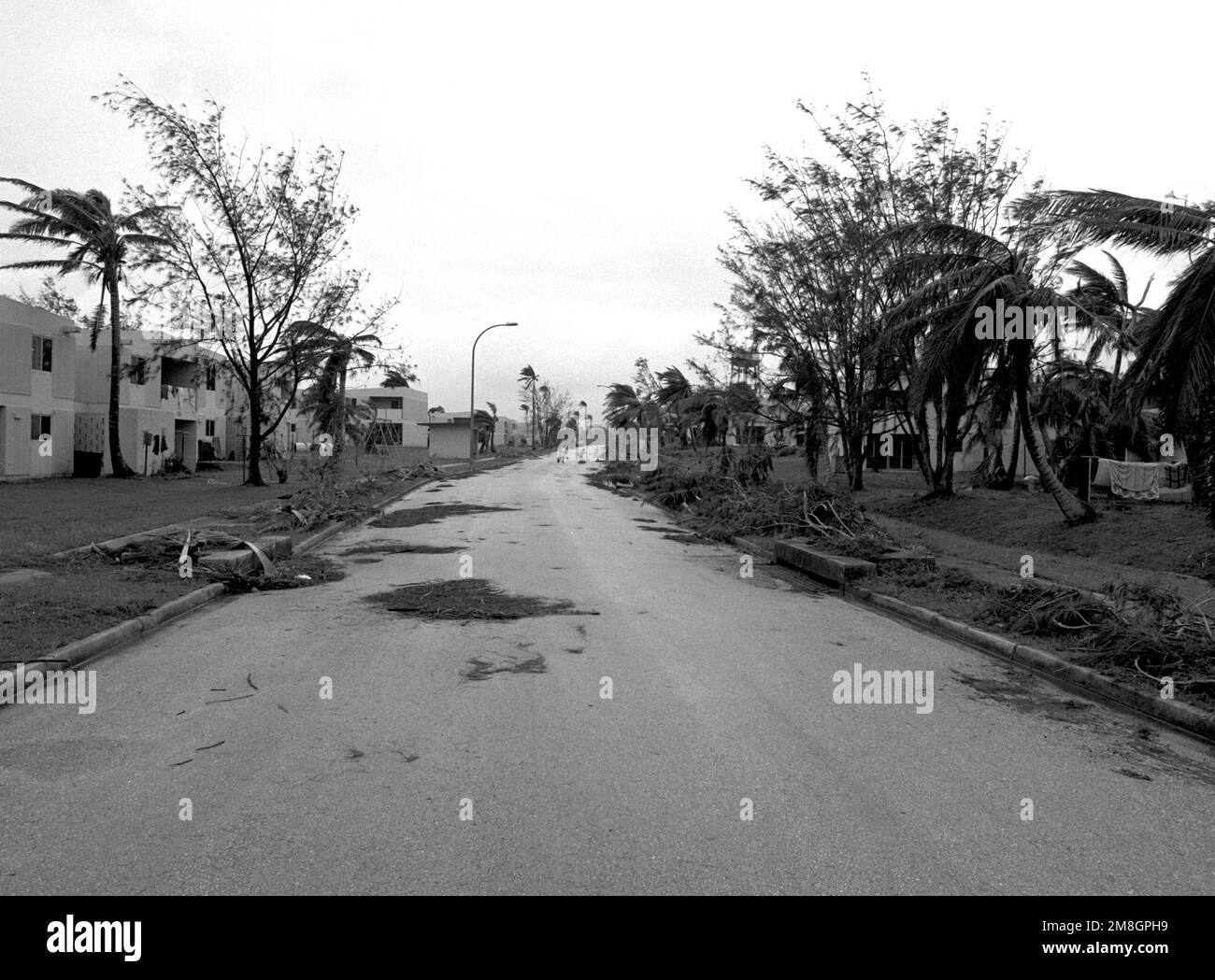 A view of damage to a housing area in the aftermath of Typhoon Omar ...