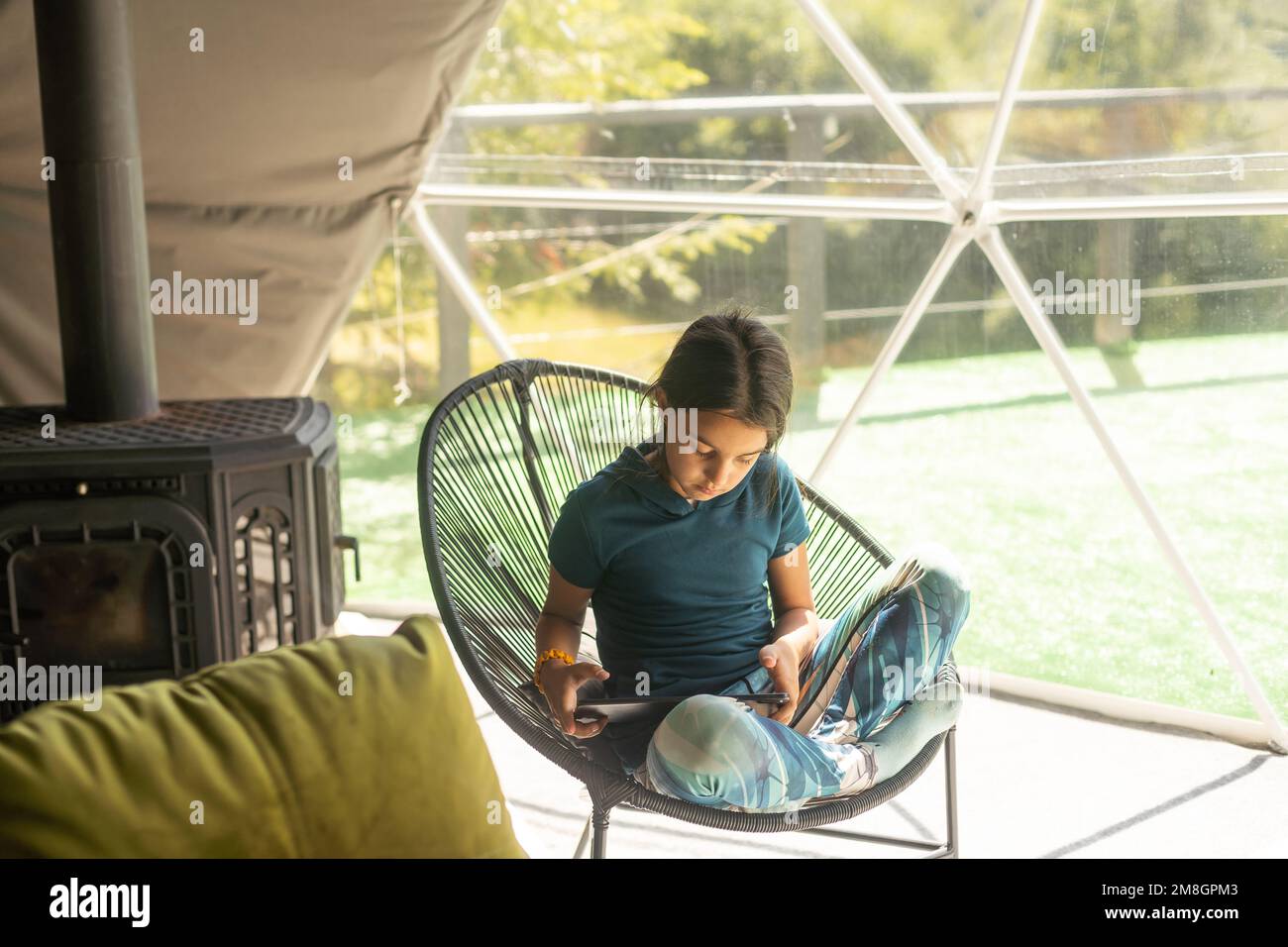 girl playing in the tablet Stock Photo - Alamy