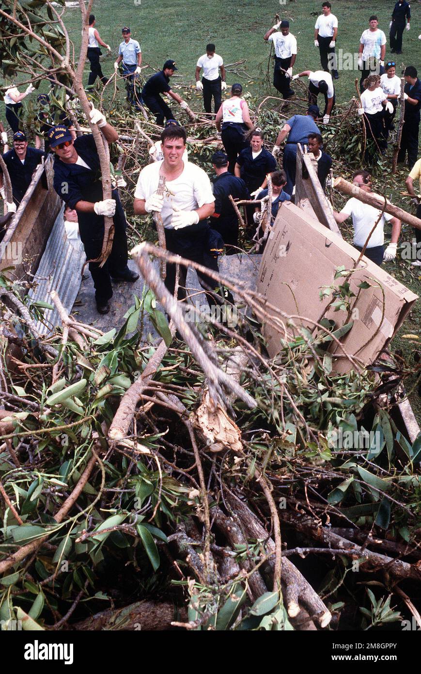 Naval personnel from Naval Air Station, Agana, Guam, take part in clean ...