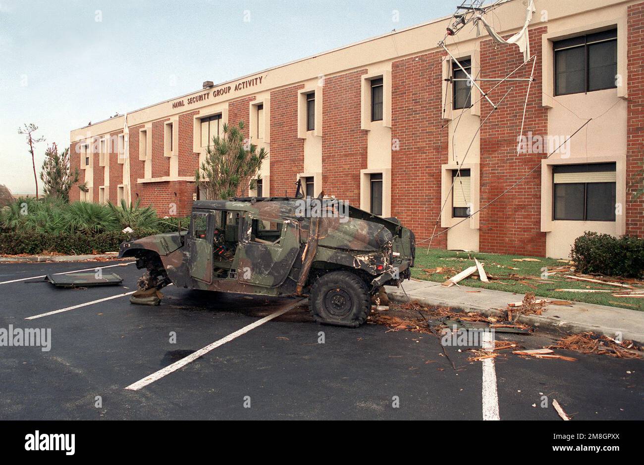 A damaged M998 High-Mobility Multipurpose Wheeled Vehicle (HMMWV), one ...
