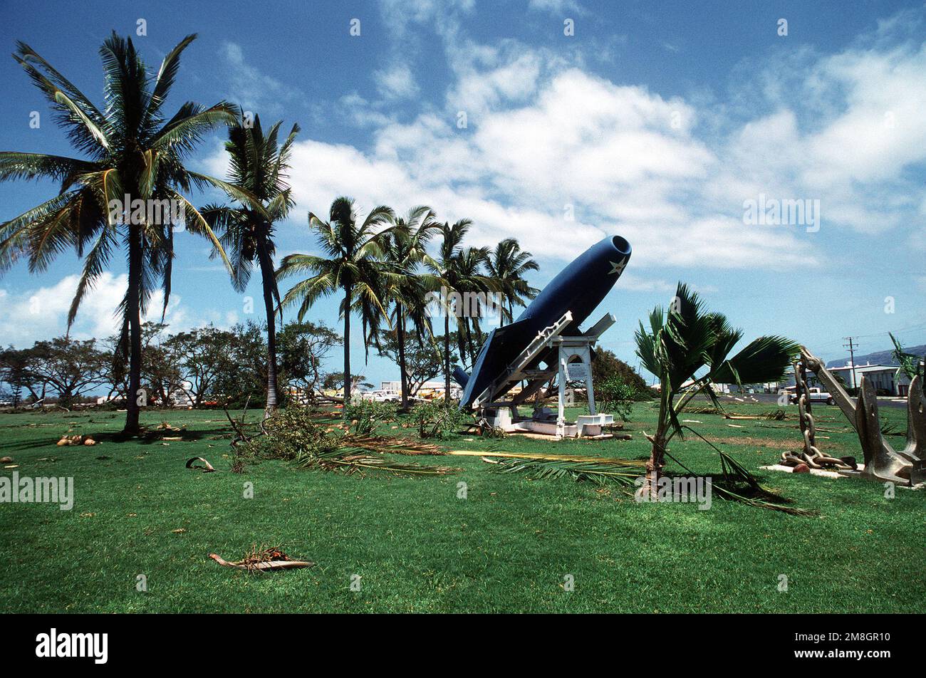Palm fronds litter the ground around a RGM-6/15 Regulus surface-to ...