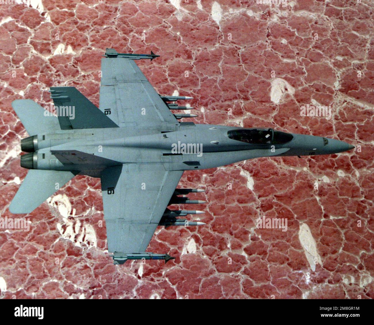An underside view of an Air Test and Evaluation Squadron 4 (VX-4) F/A ...