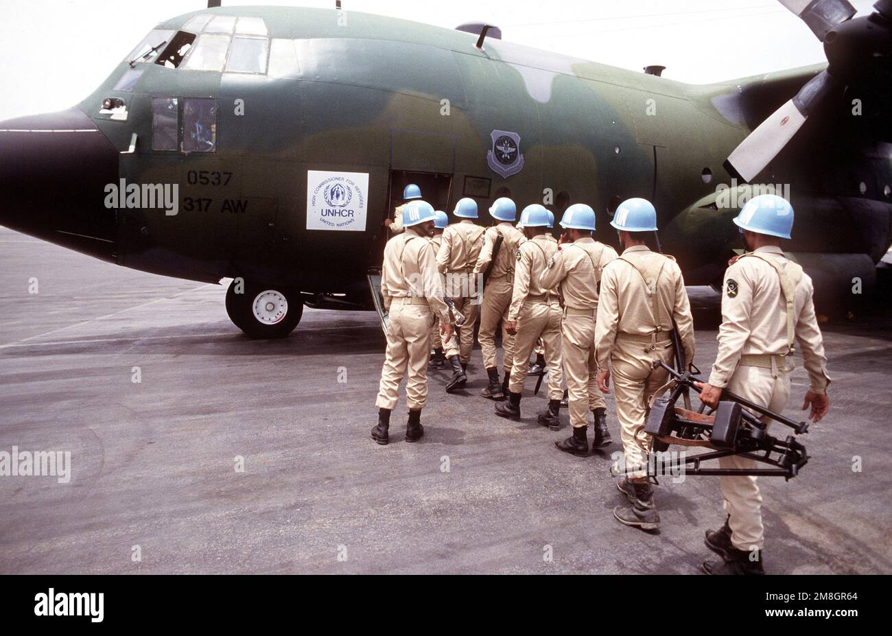 Pakistani United Nations Security troops board a US Air Force C-130 ...
