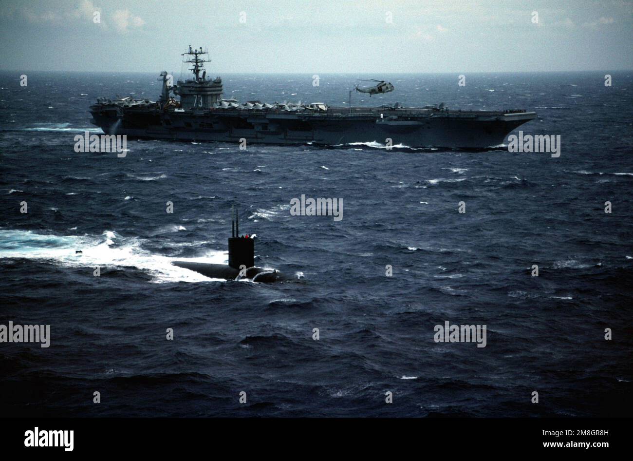 The nuclear-powered attack submarine USS HAMMERHEAD (SSN-663) is ...