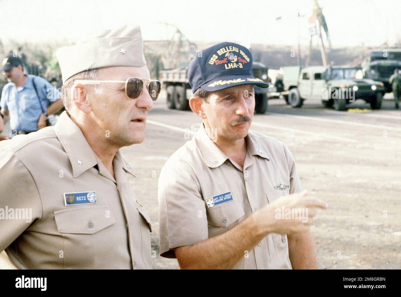 RADM William Retz, commander, Naval Base, Pearl Harbor, speaks with ...