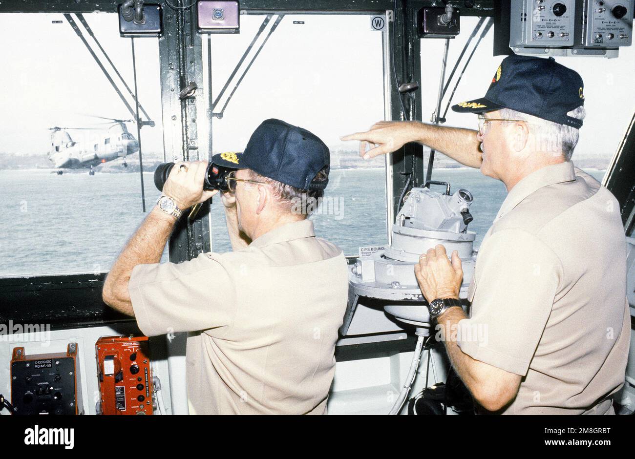 RADM William Retz, commander, Naval Base, Pearl Harbor, and CAPT ...