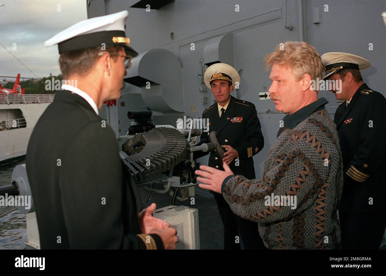 The commanding officer of the guided missile frigate USS MCCLUSKY (FFG ...