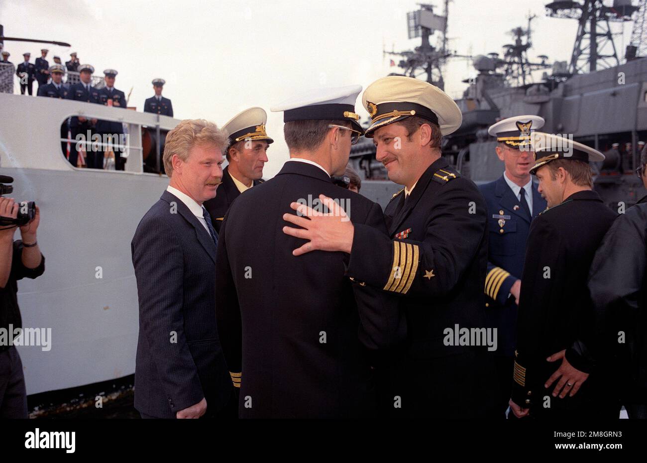 The commanding officer of the guided missile frigate USS MCCLUSKY (FFG ...