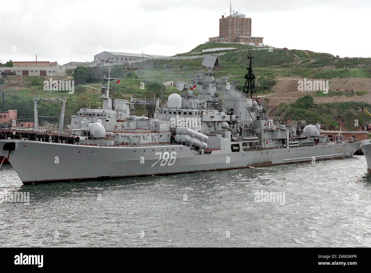 Russian sailors gather on the bow of a Sovremenny class guided missile ...