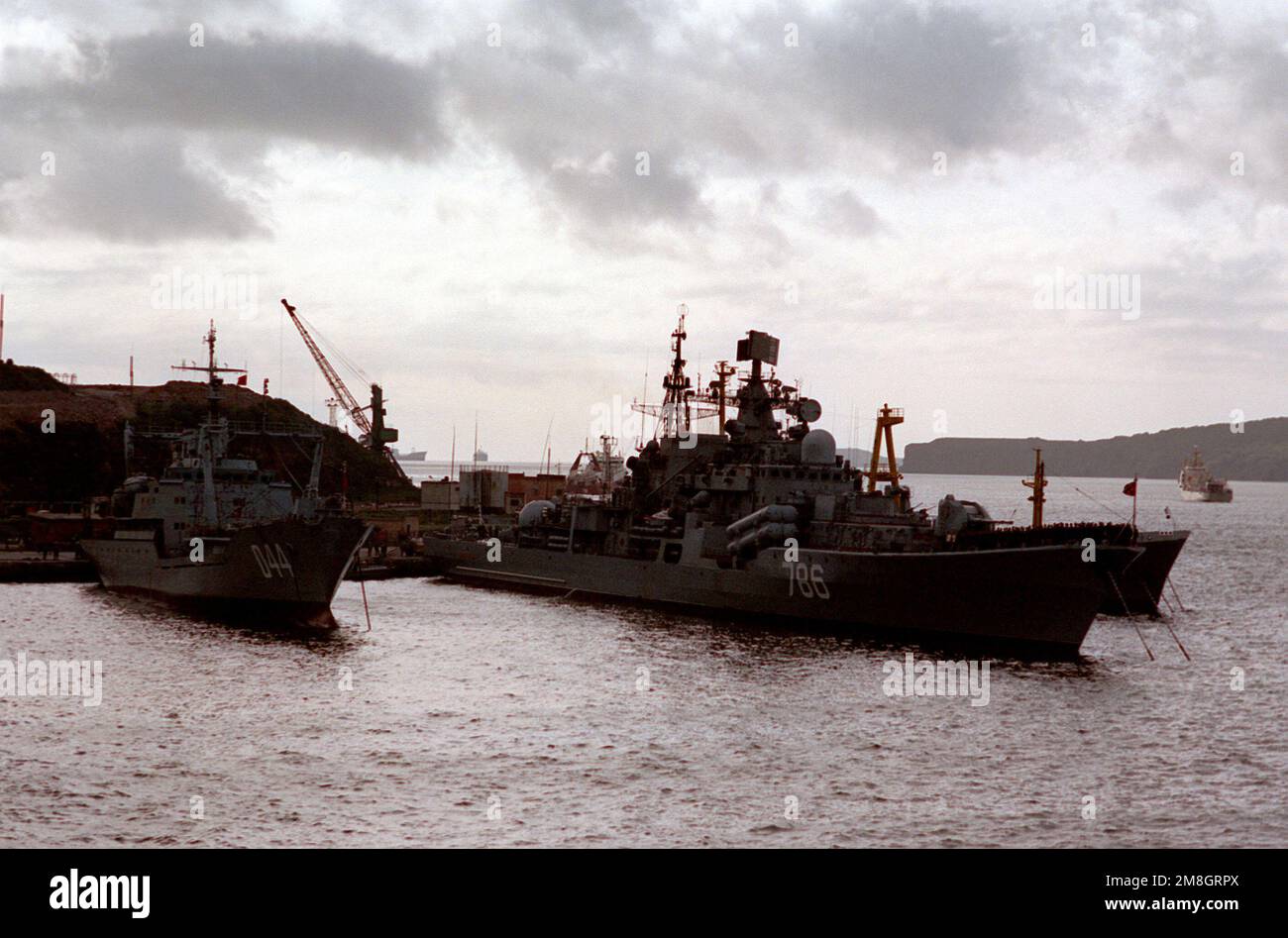 Sailors gather on the bow of a Sovremenny class guided missile ...
