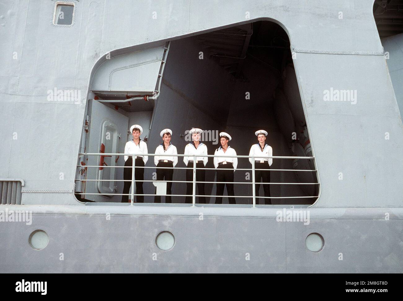 Crewmen man the rails of the Russian guided missile destroyer ADMIRAL ...