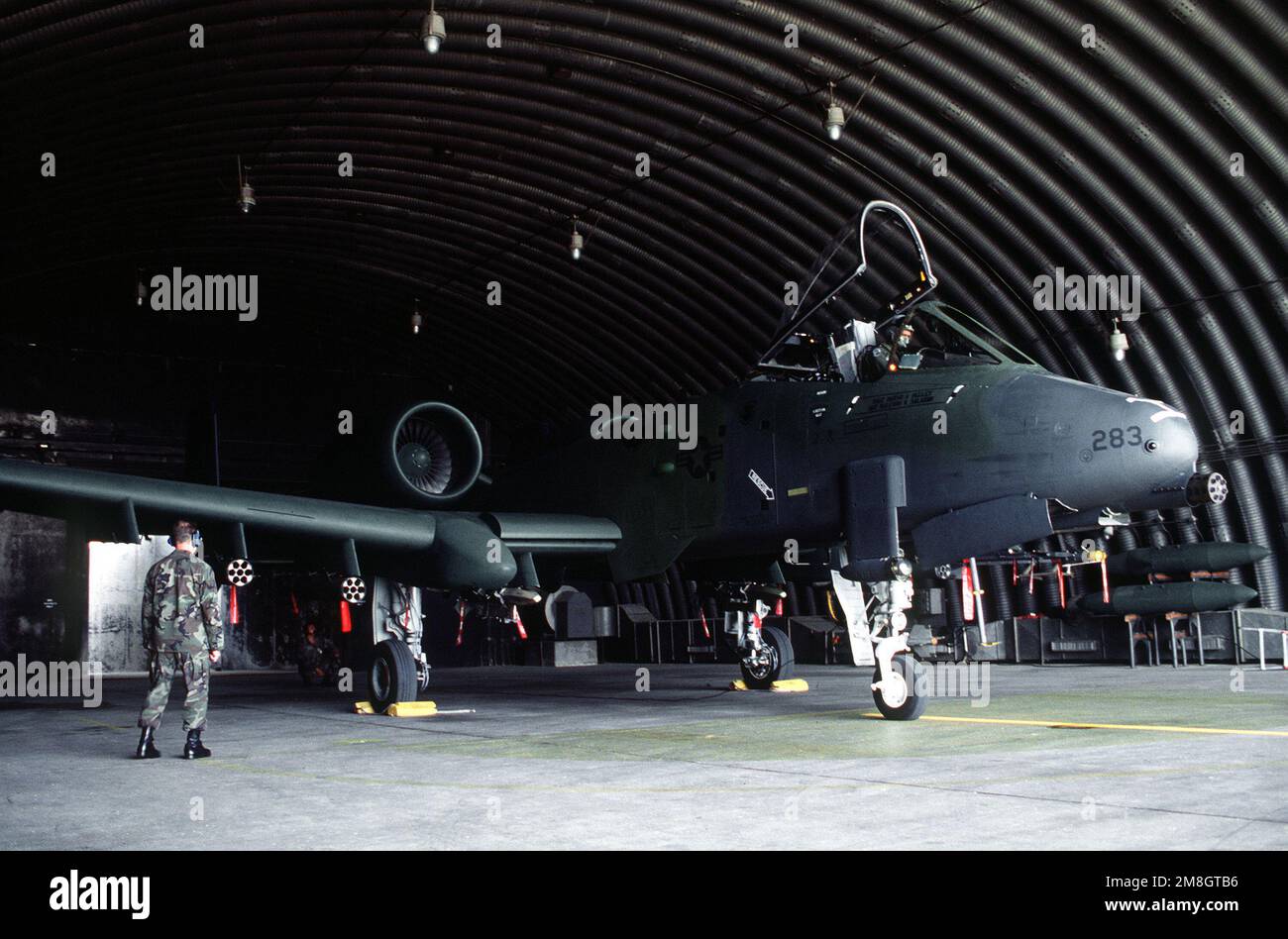 STAFF SGT. Scott Kuntz, a weapons specialist, stands in front of the ...