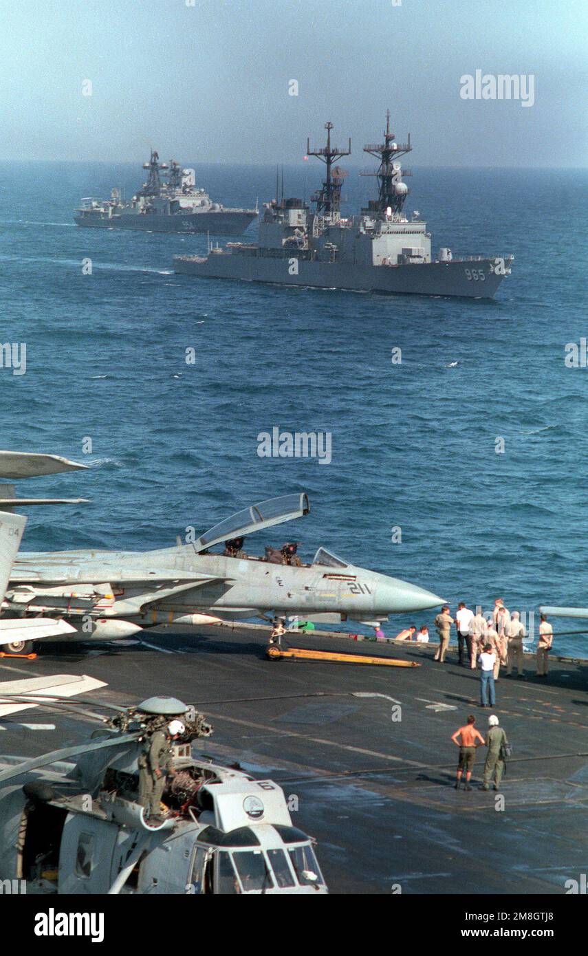 A starboard bow view of the destroyer USS KINKAID (DD-965) and the ...