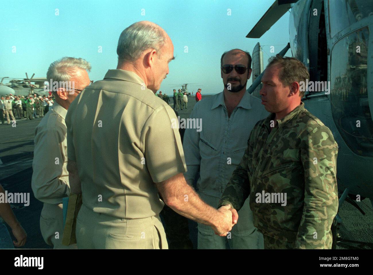 CAPT. Dennis V. McGinn, commanding officer of the aircraft carrier USS ...