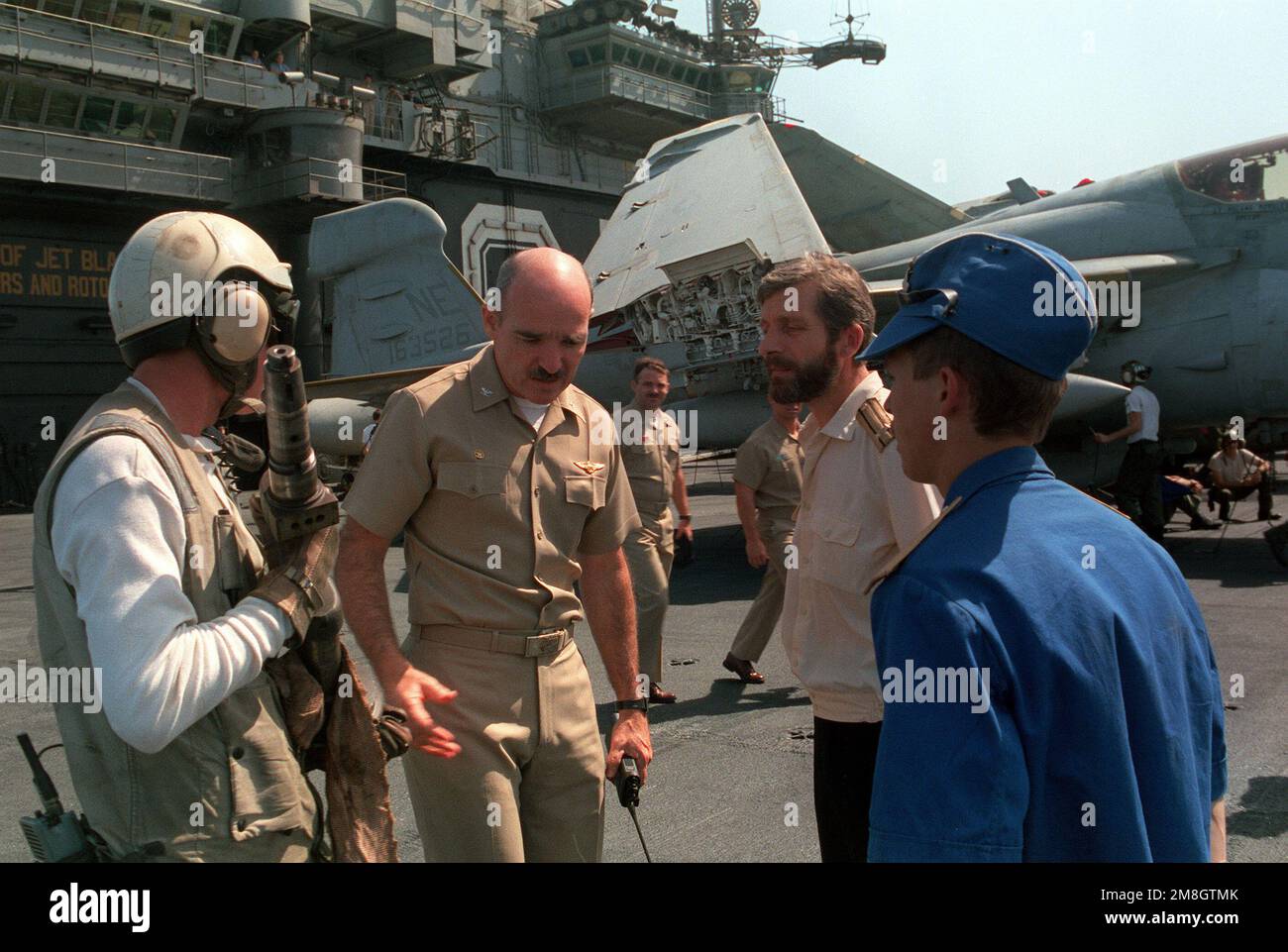 CAPT. Dennis V. McGinn, commanding officer of the aircraft carrier USS ...