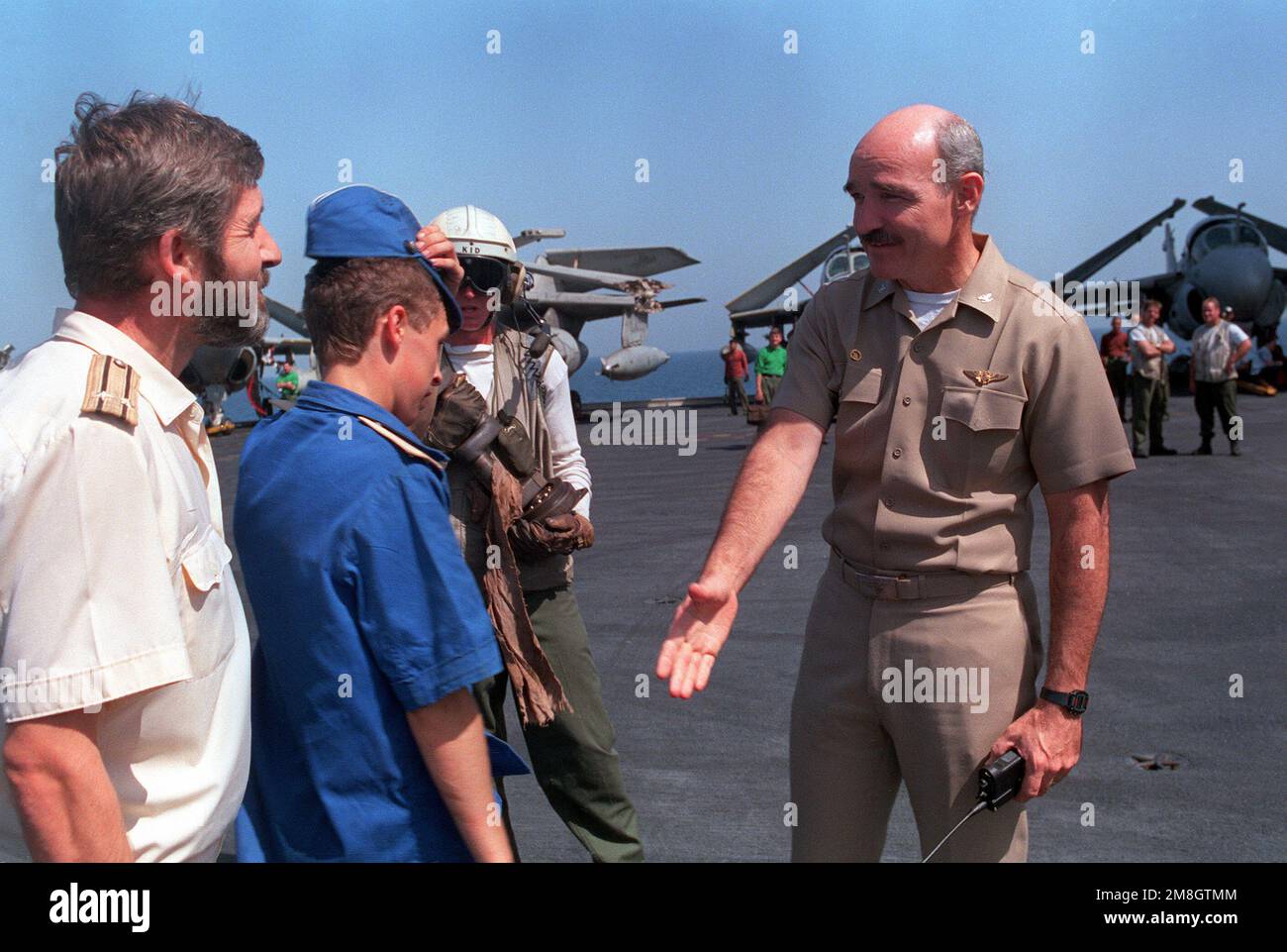 CAPT. Dennis V. McGinn, commanding officer of the aircraft carrier USS ...